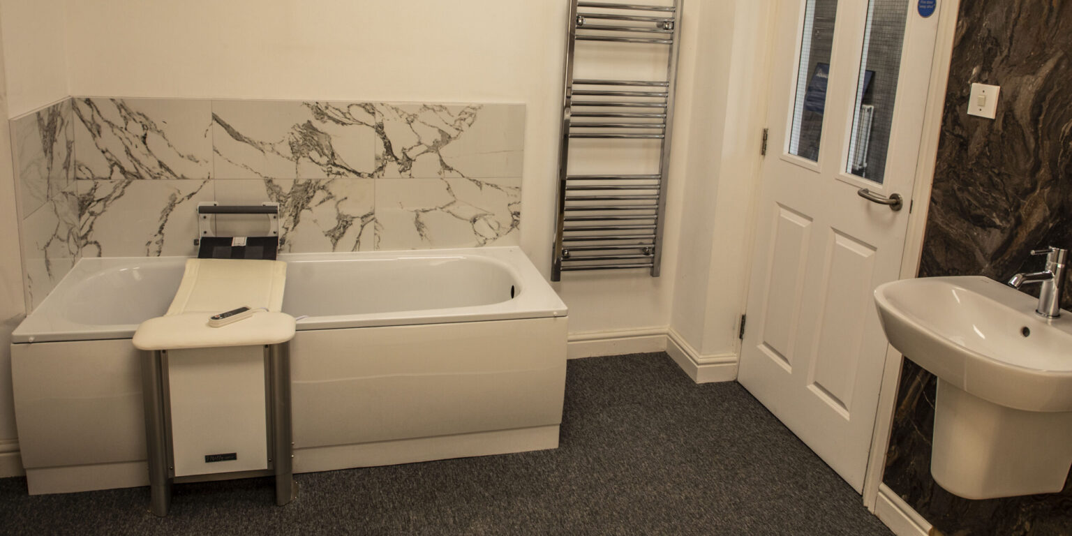 Assistance With Getting On and Off the Toilet - Aquadapt